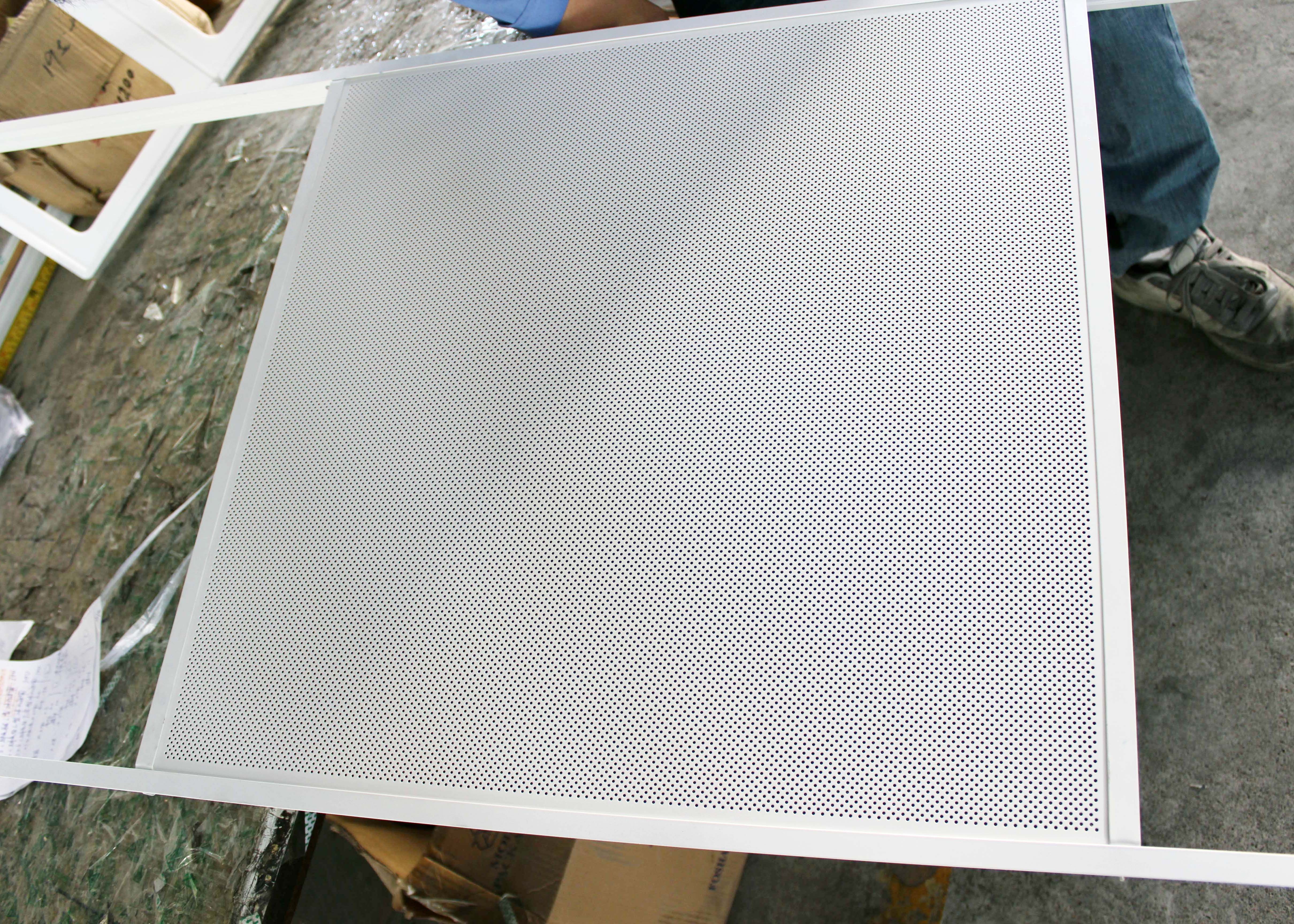 Perforated Lay on Suspended Metal Ceiling with White Tee Bar Installation